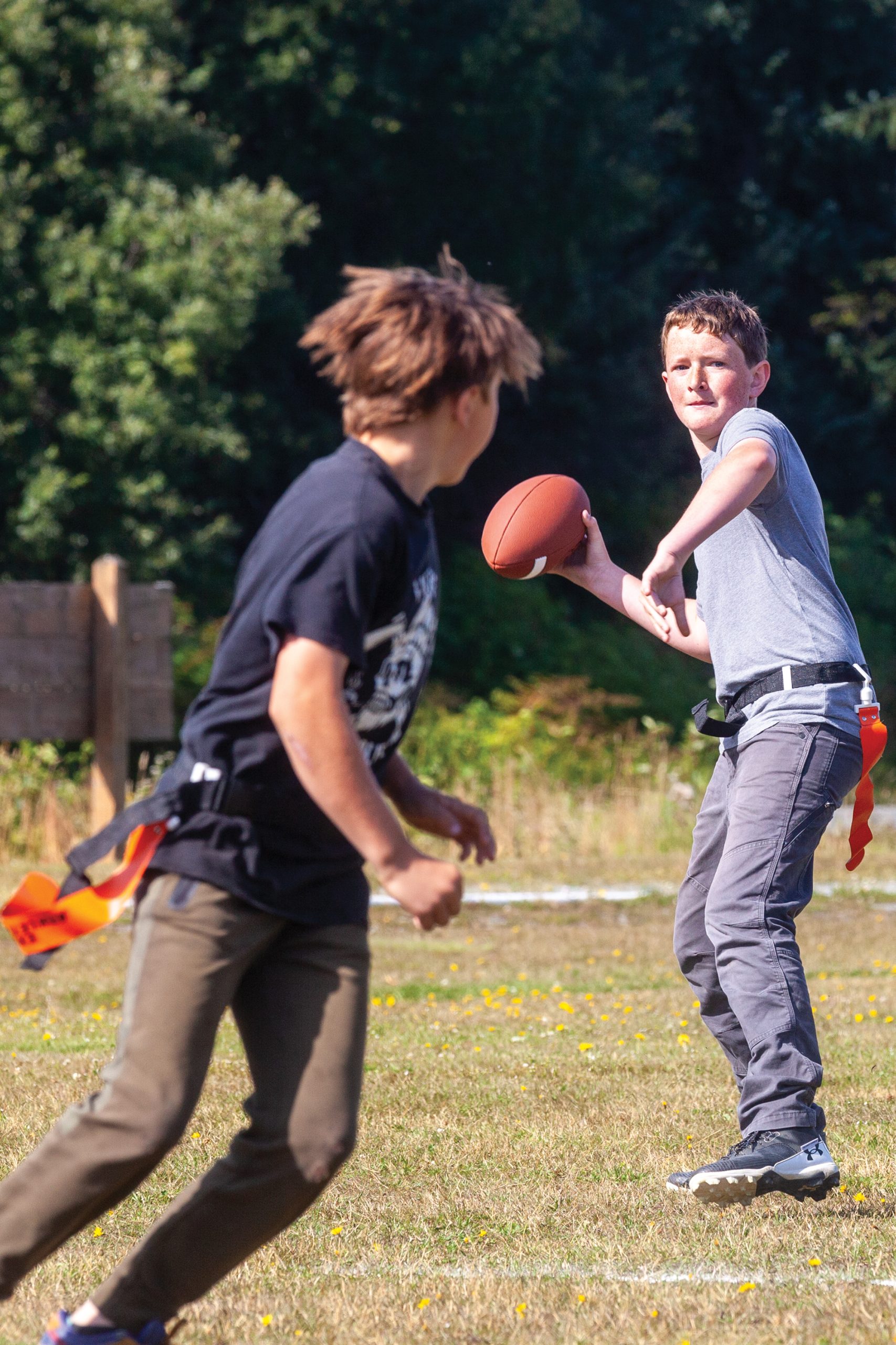 Photos of the week: First day of school, flag football, Tlingít code ...